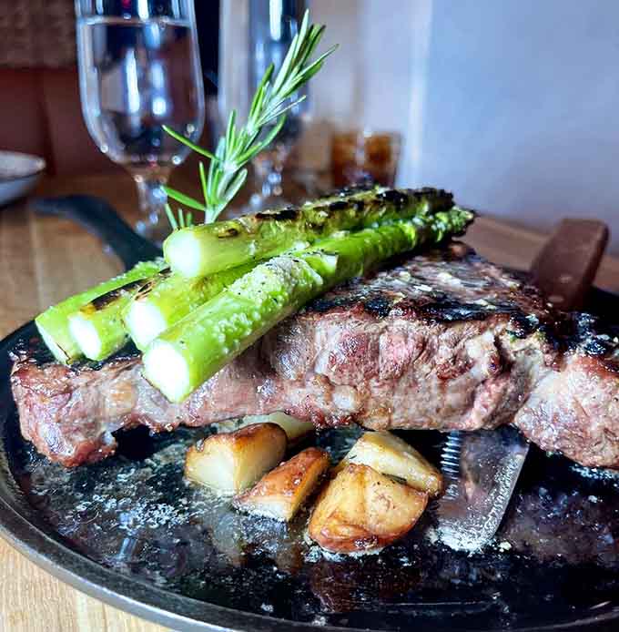 A ribeye that's been treated with the respect it deserves, complete with asparagus that actually looks appetizing.