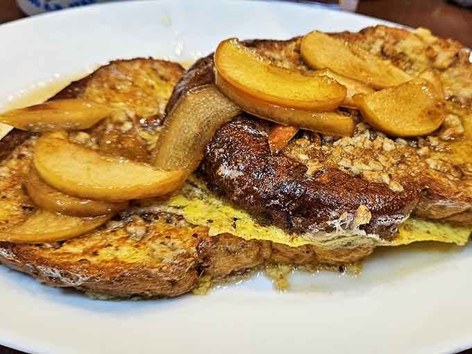 French toast topped with caramelized apples that would make even the pickiest eater reconsider their life choices.