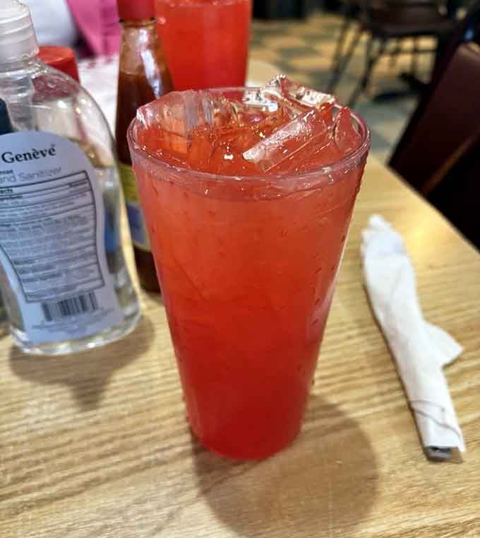 That tall glass of homemade lemonade sparkles like liquid sunshine, the perfect companion to a plate of hot fried chicken.