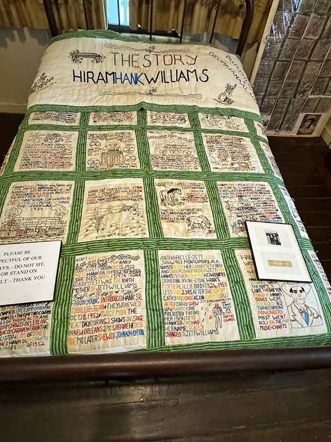 The biographical quilt displays remarkable craftsmanship while telling Hiram's journey from Georgiana boy to country music immortality.