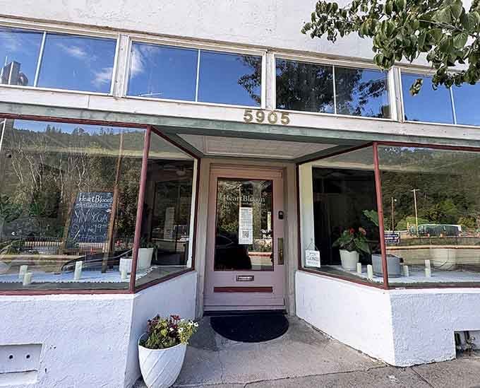 This unassuming storefront houses HeartBloom Yoga, where mountain views through the windows make downward dog feel like an alpine adventure.