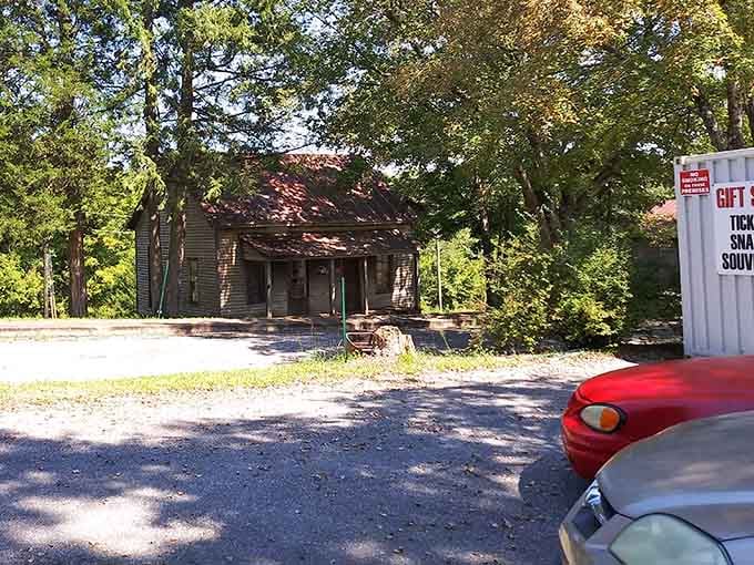 The old company store building stands sentinel, its brick facade and arched windows hinting at busier, more prosperous days.