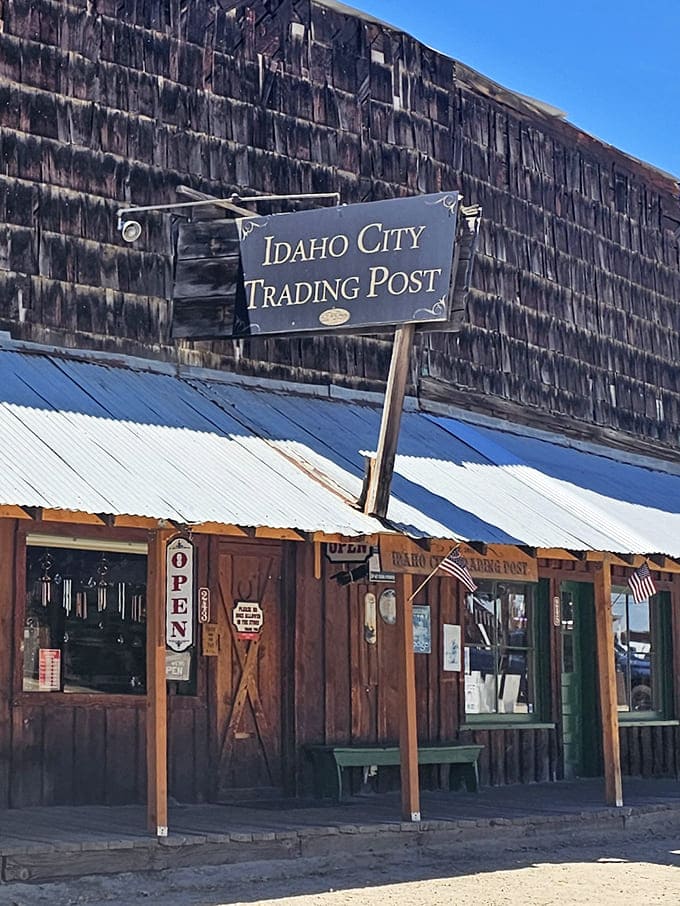 The Idaho City Trading Post wears its weathered wooden siding like badges of honor, each plank a chapter in the town's colorful story.