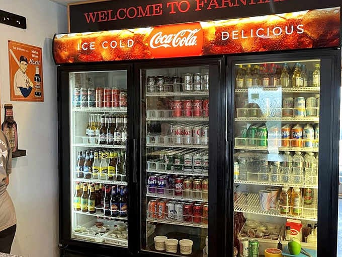That vintage Coca-Cola cooler stocked with cold drinks is like a time machine to simpler, more delicious days.