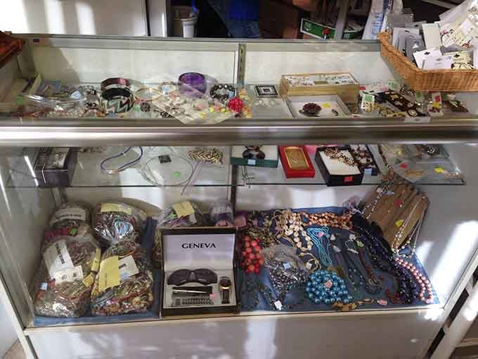 Behind glass, yesterday's jewelry awaits tomorrow's special occasions. One person's forgotten accessories become another's discovered treasures.