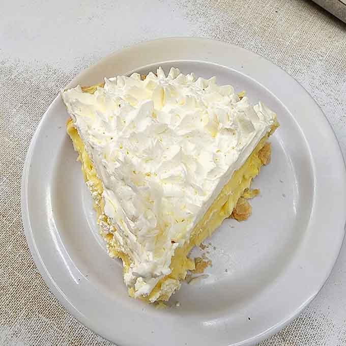 That towering slice of coconut cream pie proves Lafayette knows dessert is just as important as the main event.