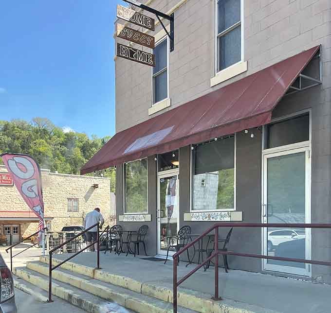 Home Sweet Home's vintage sign promises exactly what it advertises: comfort, hospitality, and genuine small-town warmth inside.