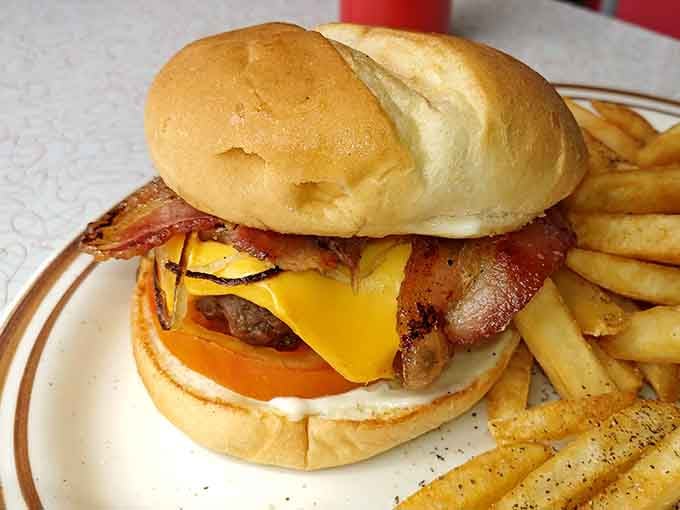 This burger stacked with bacon, cheese, and all the fixings understands its mission is pure, unadulterated deliciousness.