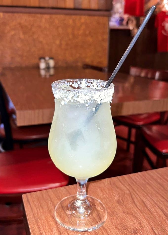 A perfectly salted margarita with enough rim to make every sip feel like a mini vacation from reality.