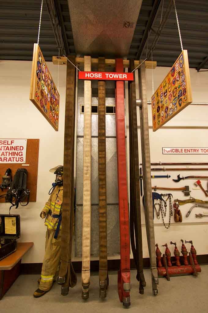 The hose tower stands tall, a testament to the organized chaos required when every second counts.