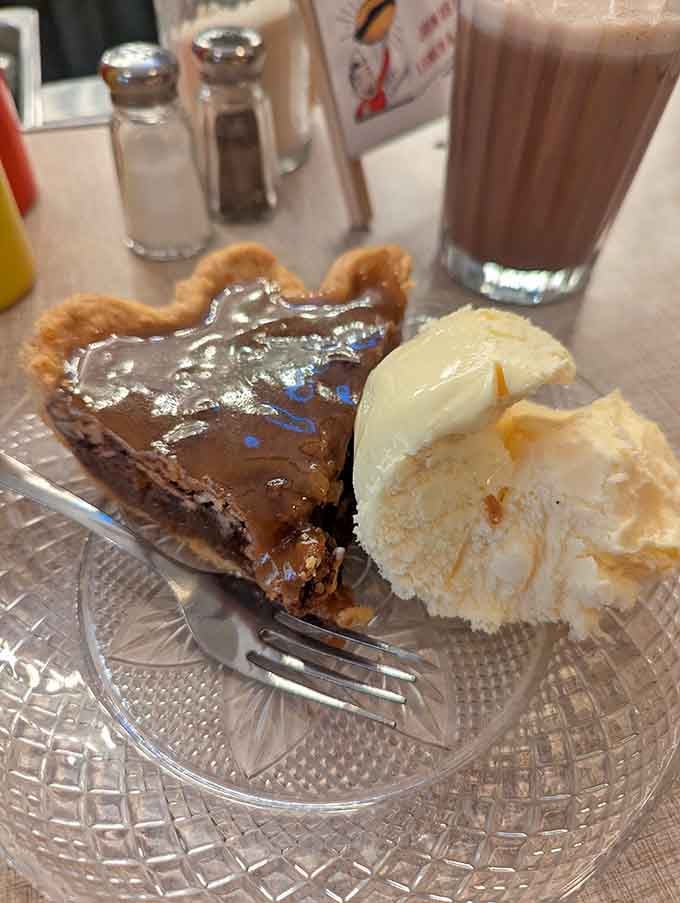 Chocolate pie with a scoop of vanilla ice cream proves that some combinations are simply meant to be together forever.