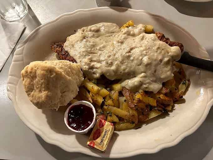 Country fried steak smothered in gravy, proving that some breakfast traditions are too good to ever change.