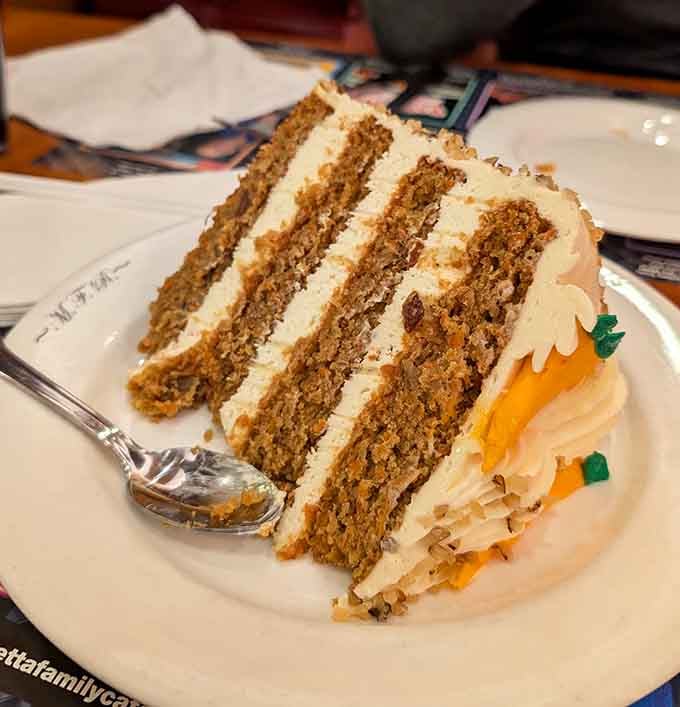 This carrot cake stands taller than most people's ambitions and tastes infinitely better than any New Year's resolution.