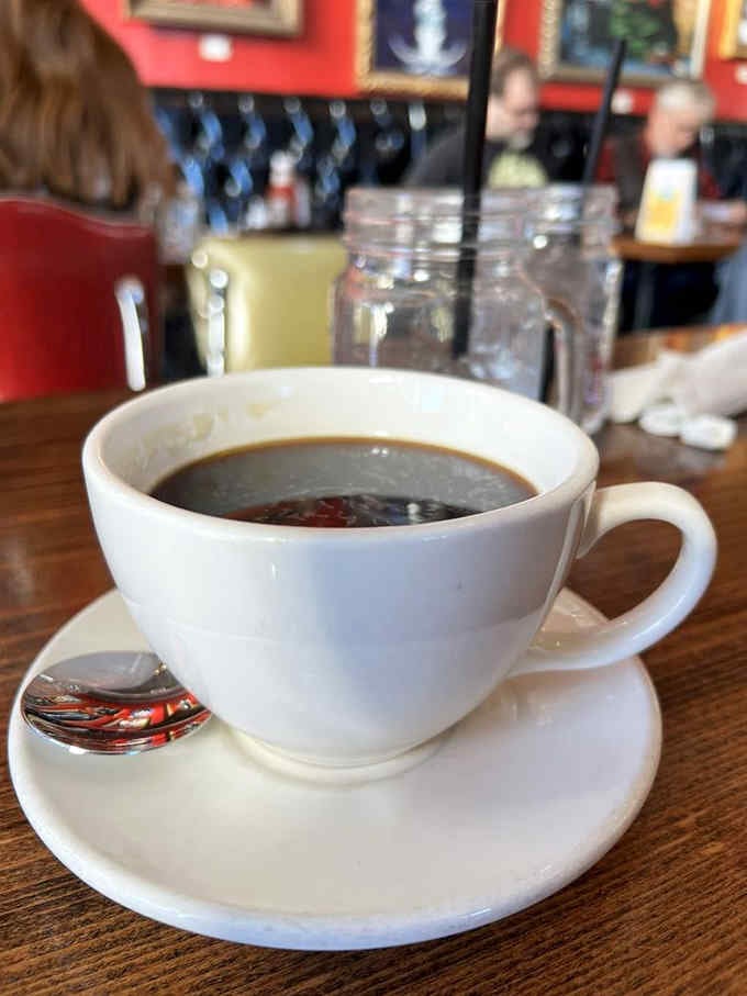 Hot coffee in a proper cup, ready to transform you from zombie to functional human being.