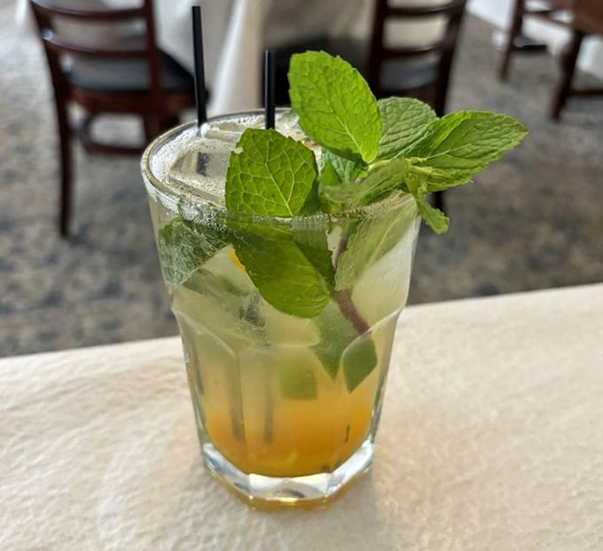 A peach mojito that tastes like Georgia summer in a glass, complete with refreshing mint and Southern charm.