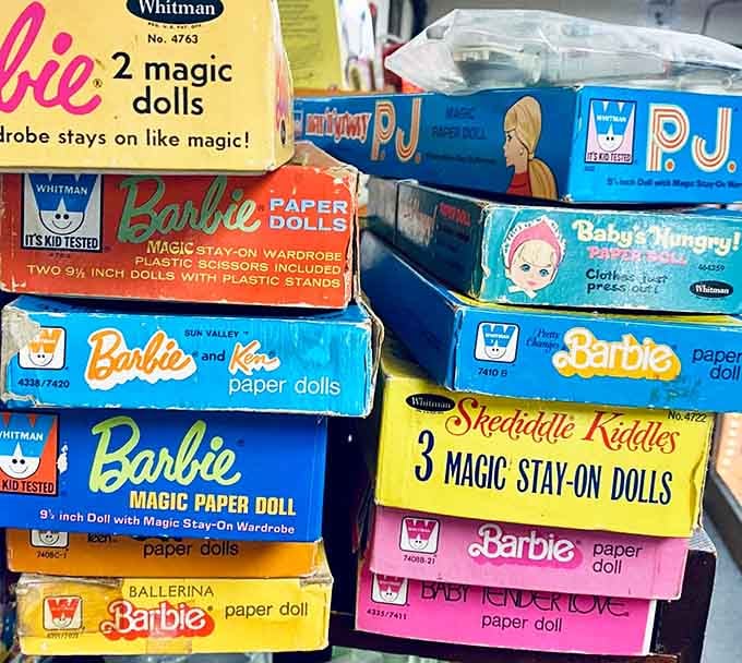 Barbie paper dolls in original boxes, proving your childhood toys are now officially museum-worthy collectibles.