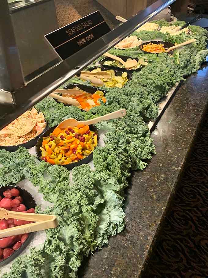 The salad bar overflows with fresh kale and colorful vegetables for anyone feeling momentarily virtuous.