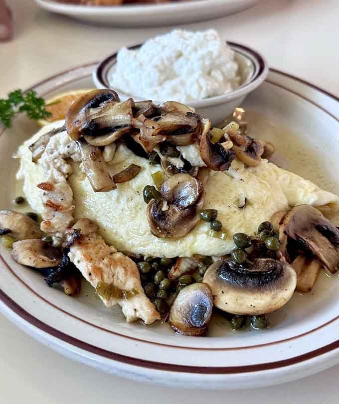 Saut&eacute;ed mushrooms and capers transform this omelet into something fancy enough for Sunday brunch with the in-laws.