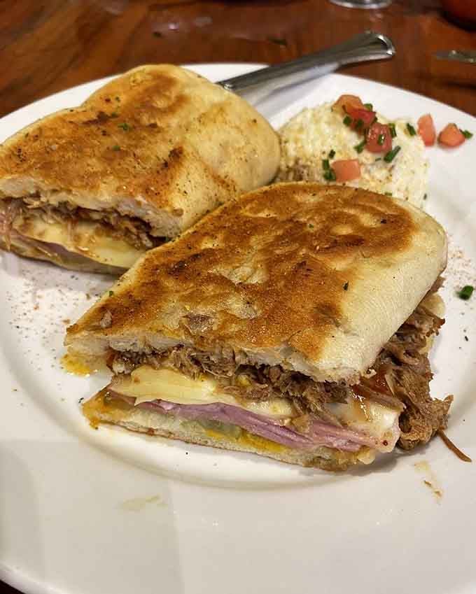 This Cuban sandwich means business, stacked so high it requires both hands and possibly a structural engineer to eat properly.