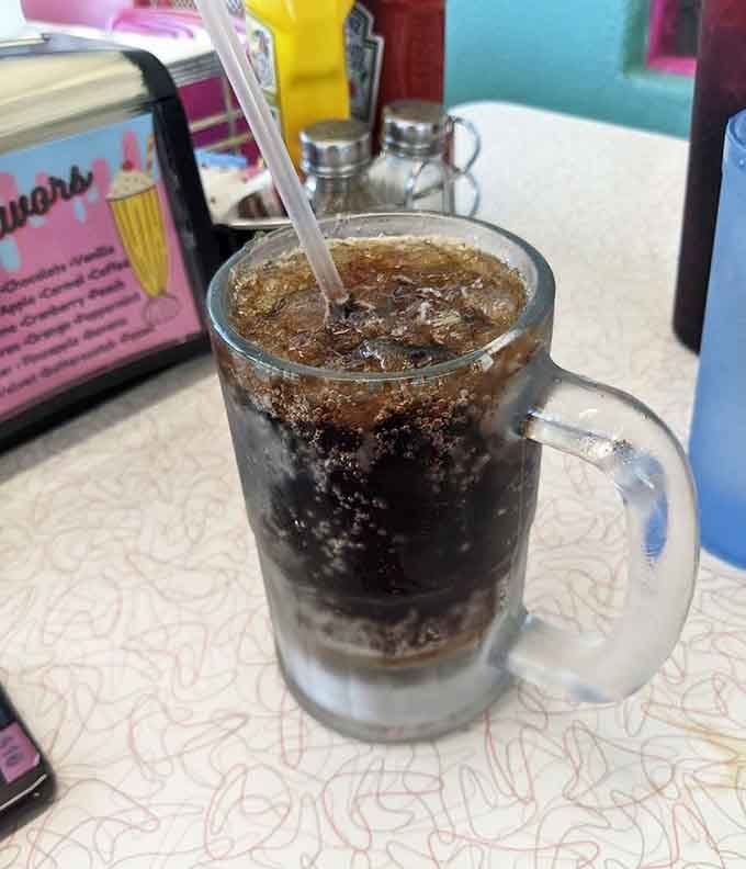 Root beer floats served in frosty mugs remind you that some pleasures transcend generations and never go out of style.