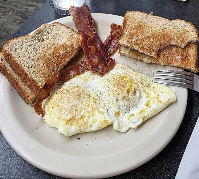 Classic diner breakfast done right: eggs, bacon, toast, and the kind of meal that fuels actual work.