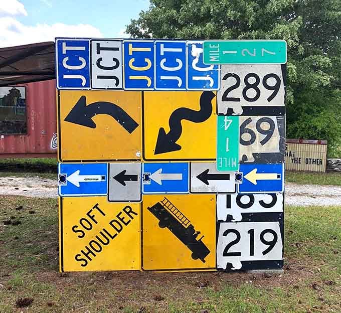 A collection of road signs arranged like a puzzle, because sometimes the journey really is more confusing than the destination.