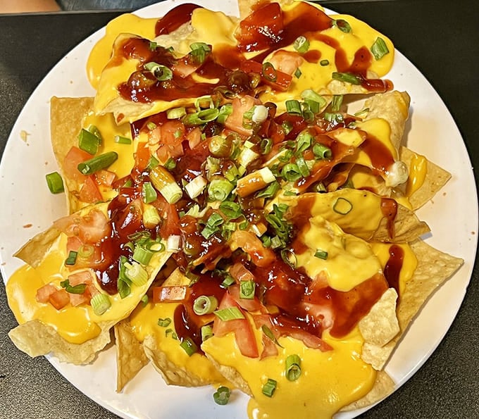 Nachos that don't skimp on toppings&mdash;a mountain of cheese, green onions, and BBQ sauce that makes sharing feel like a personal sacrifice.