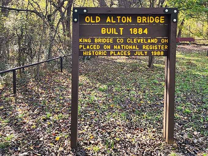 The official marker confirms what your eyes already told you: this bridge has serious historical street cred.