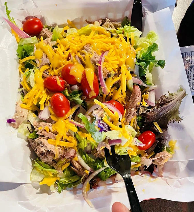 Even salads get the barbecue treatment here, proving vegetables can hang with the carnivorous crowd after all.