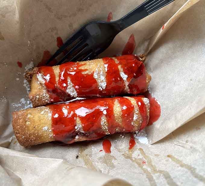 Deep fried cheesecake drizzled with chocolate, making every calorie from that walk completely and totally worth it.