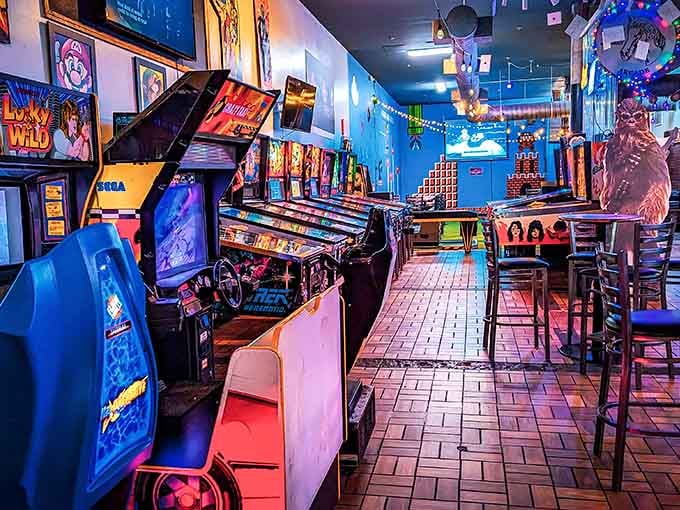 Rows of classic arcade cabinets standing at attention, ready to humble you with games you swore you mastered decades ago.