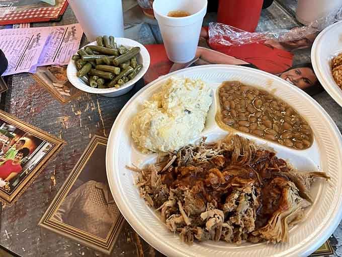 This plate tells the whole story: tender pulled pork, proper sides, and the kind of meal that defines Southern comfort.
