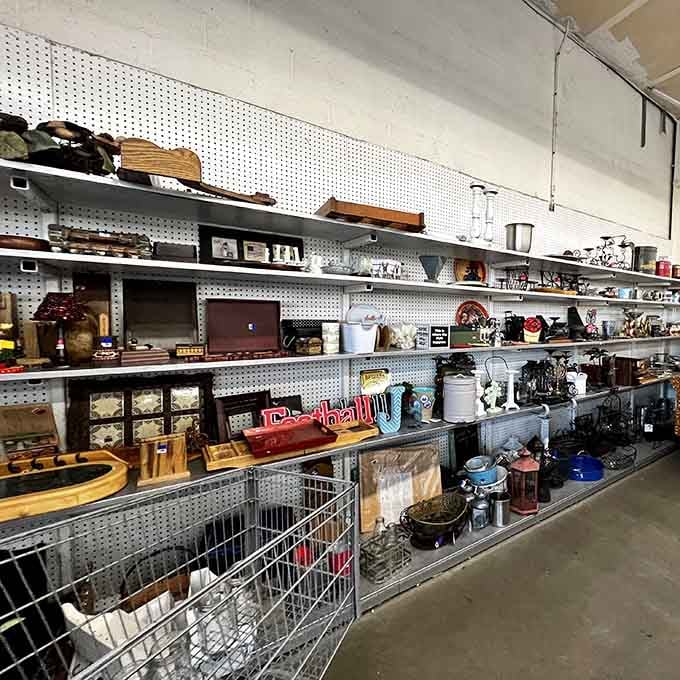 Kitchen essentials and random treasures coexist peacefully on pegboard walls, waiting for their second chances.