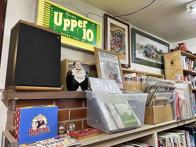 Popeye merchandise shares space with bins of bargain books, because eclectic is this store's middle name.