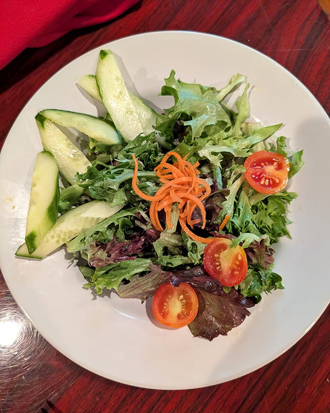 Fresh greens, ripe tomatoes, and crisp cucumbers prove that Russell's doesn't skimp on the non-seafood offerings either.