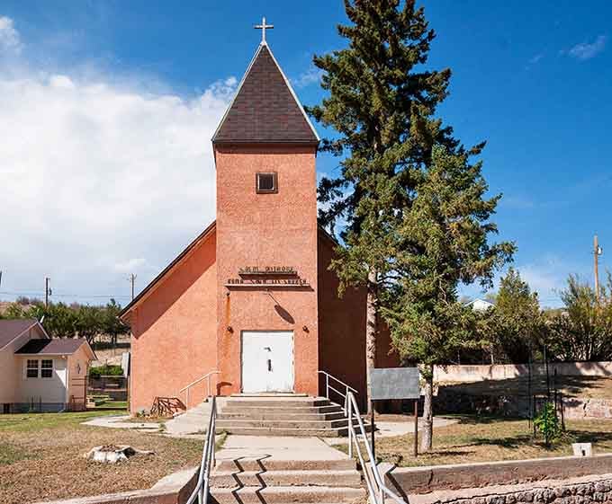 St. Anthony's Catholic Church rises from the Wyoming landscape like a spiritual sentinel, its simple beauty perfectly suited to this unpretentious town.