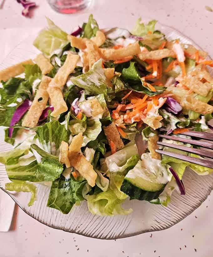 A salad that proves healthy eating doesn't have to be punishment. Those crispy wonton strips are the plot twist in this fresh veggie story.