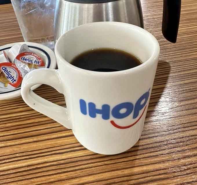 Coffee served in an IHOP mug because good diners know it's what's inside that truly counts here.
