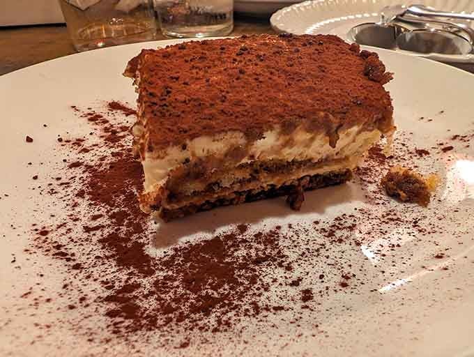 Tiramisu so good it makes you forget you just ate an entire pizza, or at least feel better about it.