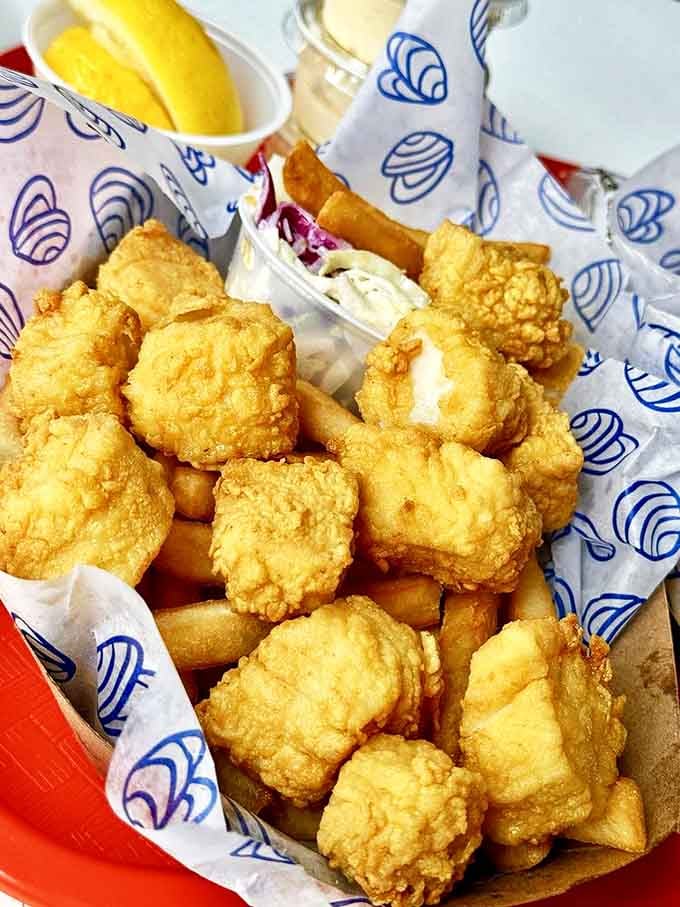 These golden nuggets of fried scallop goodness are what seafood dreams are made of&mdash;crispy outside, tender inside, and worth every mile of your journey.