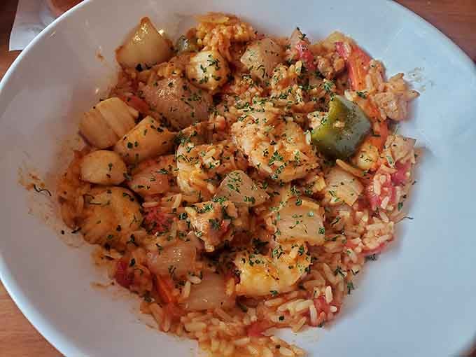 Seafood jambalaya that brings the Gulf Coast to Gulf of Maine. A colorful medley where every forkful tells a different delicious story.