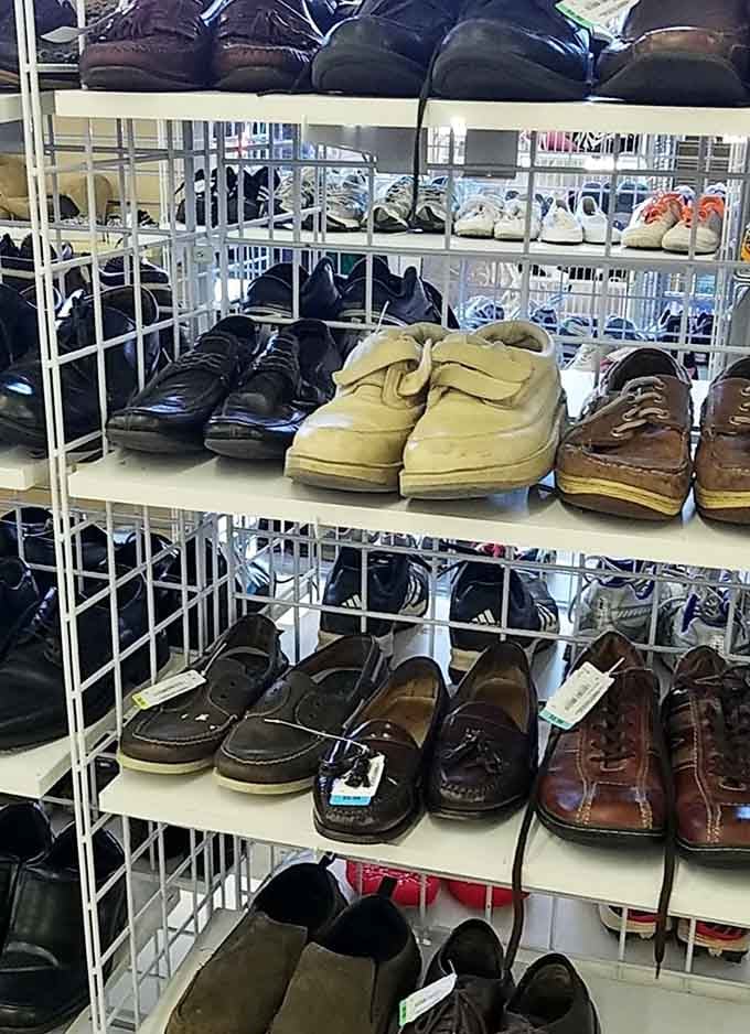 Men's shoes lined up like hopeful contestants on a dating show, each one waiting for the right feet to come along.