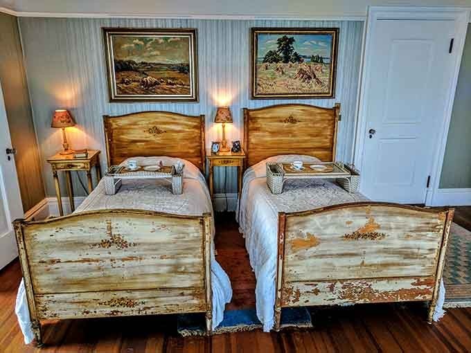 Twin beds in a castle bedroom, proving that even medieval-style living comes with practical sleeping arrangements.