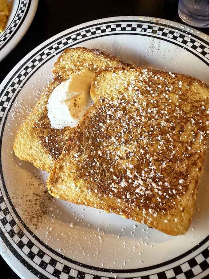 French toast dusted with powdered sugar like fresh snow, because even classics deserve a little glamour at any hour.