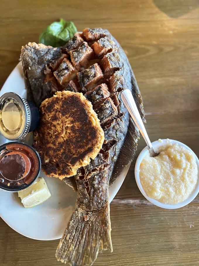 Whole fried flounder with a crab cake sidekick, because sometimes one protein just isn't enough for happiness.