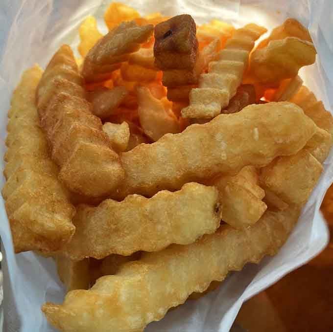 Those crinkle-cut fries bring serious nostalgia vibes, like your childhood cafeteria but actually good this time around.