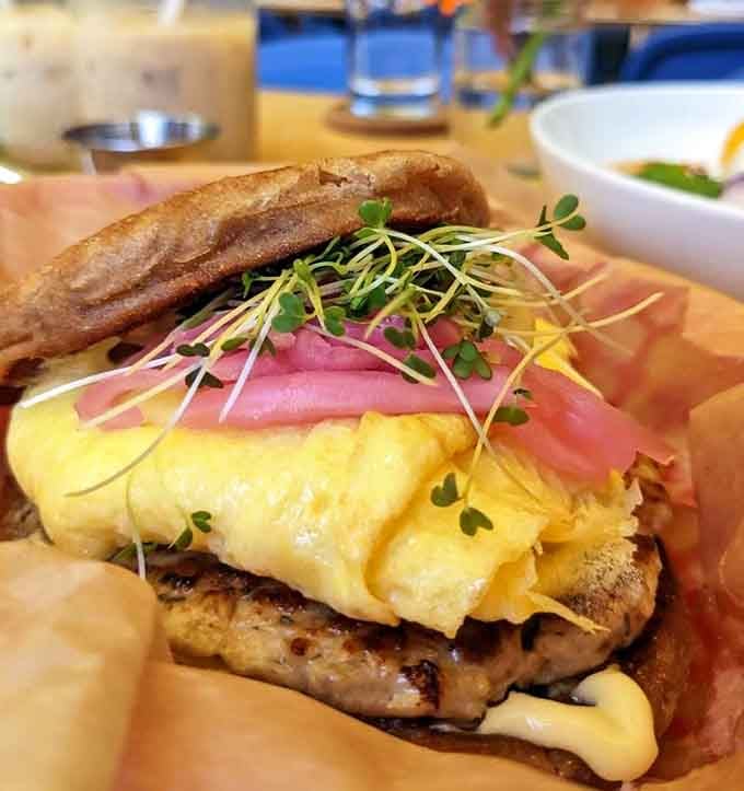 Sometimes the best things come in simple packages, like this perfectly stacked English muffin sandwich screaming with flavor.