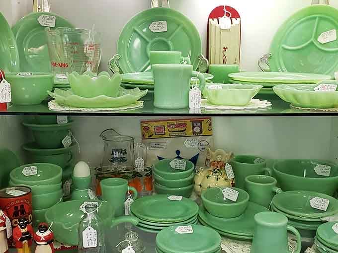 Jadeite collectors, prepare your wallets because this green glassware display is absolutely calling your name.