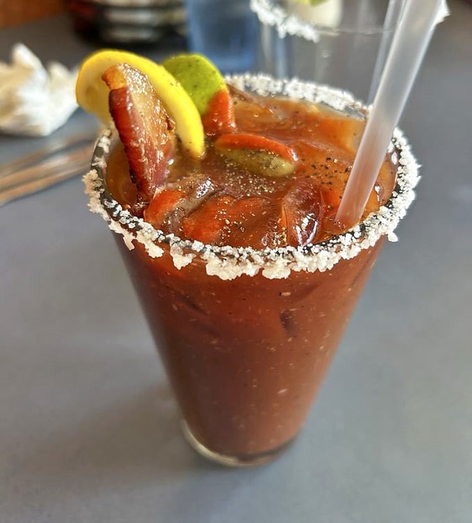 A Bloody Mary garnished like it's auditioning for a role in a food magazine's greatest hits.