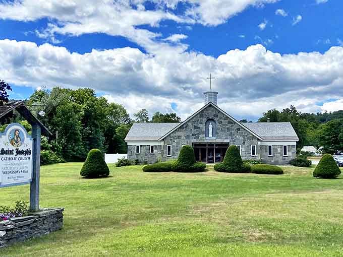 St. Joseph's stone church provides a moment of tranquility amid the treasure hunting, its Vermont fieldstone exterior as solid as the community's foundations.